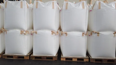 Stacking of bulk cargo in jumbo bags are... | Stock Video | Pond5