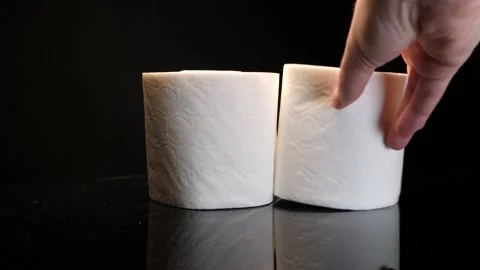 Stacking toilet paper on a rolling table | Stock Video | Pond5
