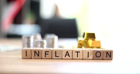 Stacks of coins and gold bars word infla... | Stock Video | Pond5