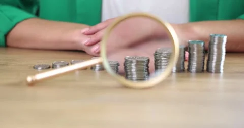 Stacks of coins in ascending order are v... | Stock Video | Pond5