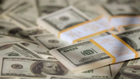 Stacks of money falling from above on th... | Stock Video | Pond5