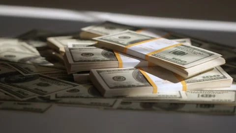 Stacks of money falling from above on th... | Stock Video | Pond5