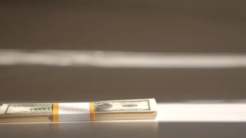 Stacks of money falling from above on th... | Stock Video | Pond5