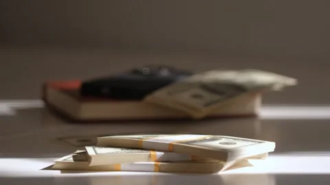 Stacks of money falling from above on th... | Stock Video | Pond5