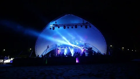 Stage and a disco on the beach. Night Be... | Stock Video | Pond5