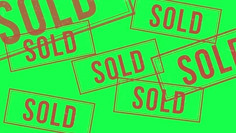 stamp pressing SOLD onto a green screen ... | Stock Video | Pond5