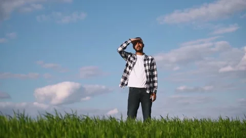 Standing and looking far away. | Stock Video | Pond5