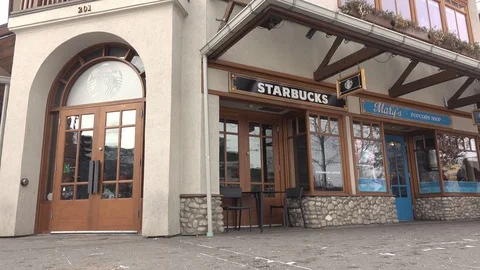 Starbucks coffee daytime downtown of Ban... | Stock Video | Pond5