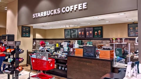 Starbucks coffee shop inside Target stor... | Stock Video | Pond5