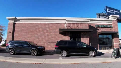 Starbucks restaurant drive thru lines ex... | Stock Video | Pond5