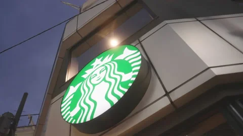 Starbucks Sign Illuminated At Night On B... | Stock Video | Pond5