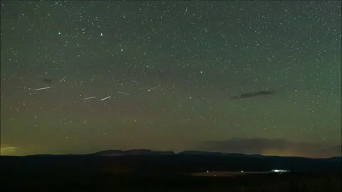 Starlink Satellite Flares Over Mountains | Stock Video | Pond5