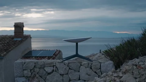 Starlink satellite internet receiver dis... | Stock Video | Pond5