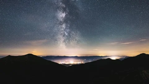 Starry night sky in mountains Time lapse... | Stock Video | Pond5