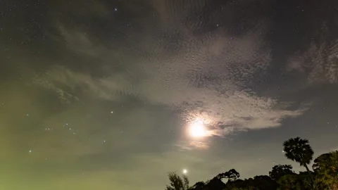 Stars and moon rise light movement time ... | Stock Video | Pond5