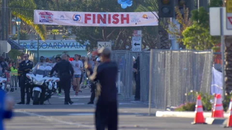 The start and finish line of a 10K race. | Stock Video | Pond5