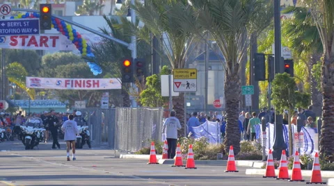 The start and finish line of a 10K race. | Stock Video | Pond5