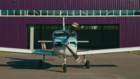 Starting the engine propeller of a singl... | Stock Video | Pond5