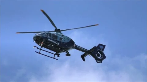 State Police Helicopter flying overhead | Stock Video | Pond5
