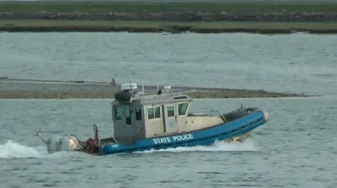 State Police Patrol Boat heads up river | Stock Video | Pond5
