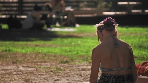 Static back view shot of woman sunbathin... | Stock Video | Pond5