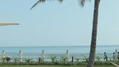 Static Shot Of A Beach With Local Kids W... | Stock Video | Pond5