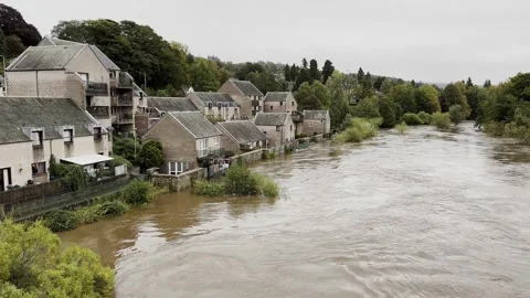 Static shot of buildings being flooded b... | Stock Video | Pond5