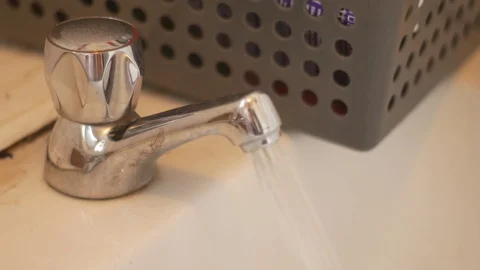 Static shot of chrome tap running hot wa... | Stock Video | Pond5