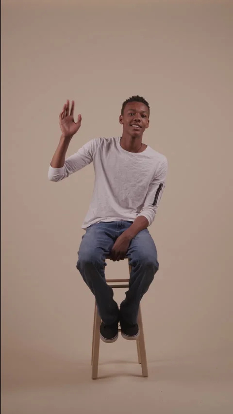 Static shot of Happy Man sitting on chai... | Stock Video | Pond5