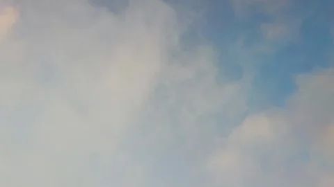 A static shot of low hanging clouds roll... | Stock Video | Pond5