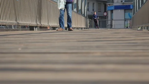 Static shot of a man on a pedestrian bri... | Stock Video | Pond5
