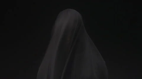 Static shot of Mysterious Ghost in black... | Stock Video | Pond5