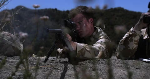 Static shot of sniper shooting a rifle w... | Stock Video | Pond5