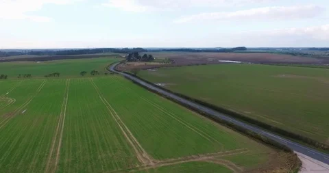 Stationary drone shot of a road as cars ... | Stock Video | Pond5