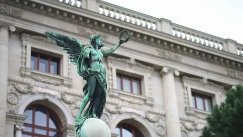 Statue of an angel with laurel wreaths a... | Stock Video | Pond5