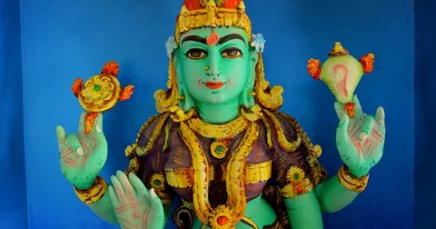 Statue of Blue Skinned Deity with Four H... | Stock Video | Pond5