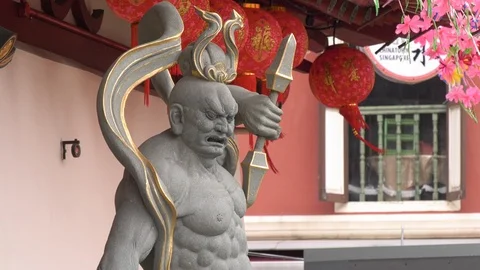 Statue of a Chinese Deity with lanterns ... | Stock Video | Pond5