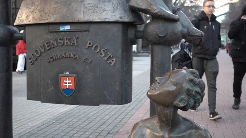 statue of two girls leaning on a post bo... | Stock Video | Pond5