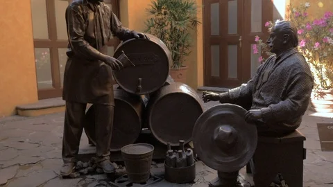 Statue of two Mexican men drinking tequi... | Stock Video | Pond5