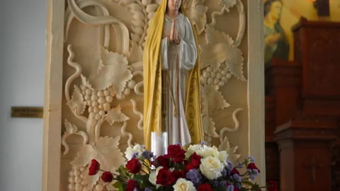 Statue of the Virgin Mary standing indoo... | Stock Video | Pond5