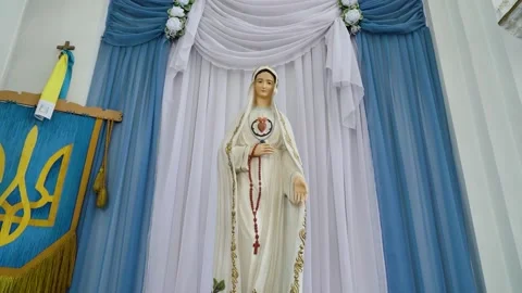 Statue of the Virgin Mary standing indoo... | Stock Video | Pond5