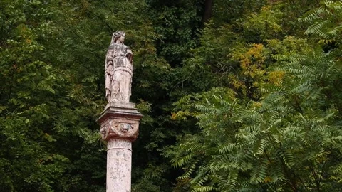 Statue of Zeitei Diana with forest trees... | Stock Video | Pond5