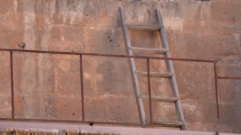 Status Quo, Immovable Ladder in the Chur... | Stock Video | Pond5