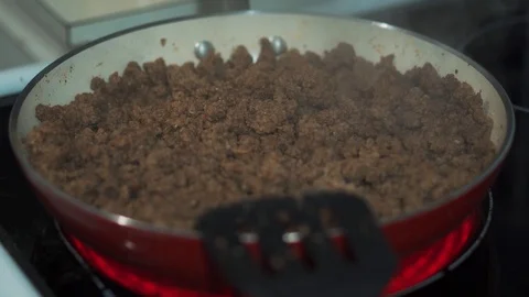 Steam Coming Off Ground Beef in Red Pan | Stock Video | Pond5