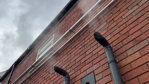 Steam coming out from pipes on brick wal... | Stock Video | Pond5