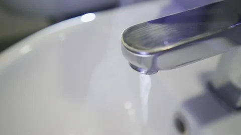Steam from hot water in the sink. Hot ta... | Stock Video | Pond5