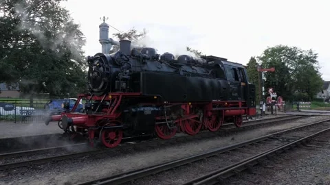 Steam locomotive driving backwards on ra... | Stock Video | Pond5