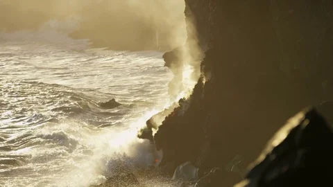 Steam produced by volcanic lava falling ... | Stock Video | Pond5