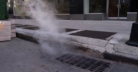 Steam rising from Manhole in New York Ci... | Stock Video | Pond5