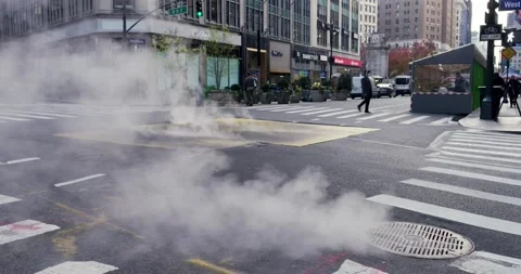 Steam rising from sewer system in NYC. S... | Stock Video | Pond5